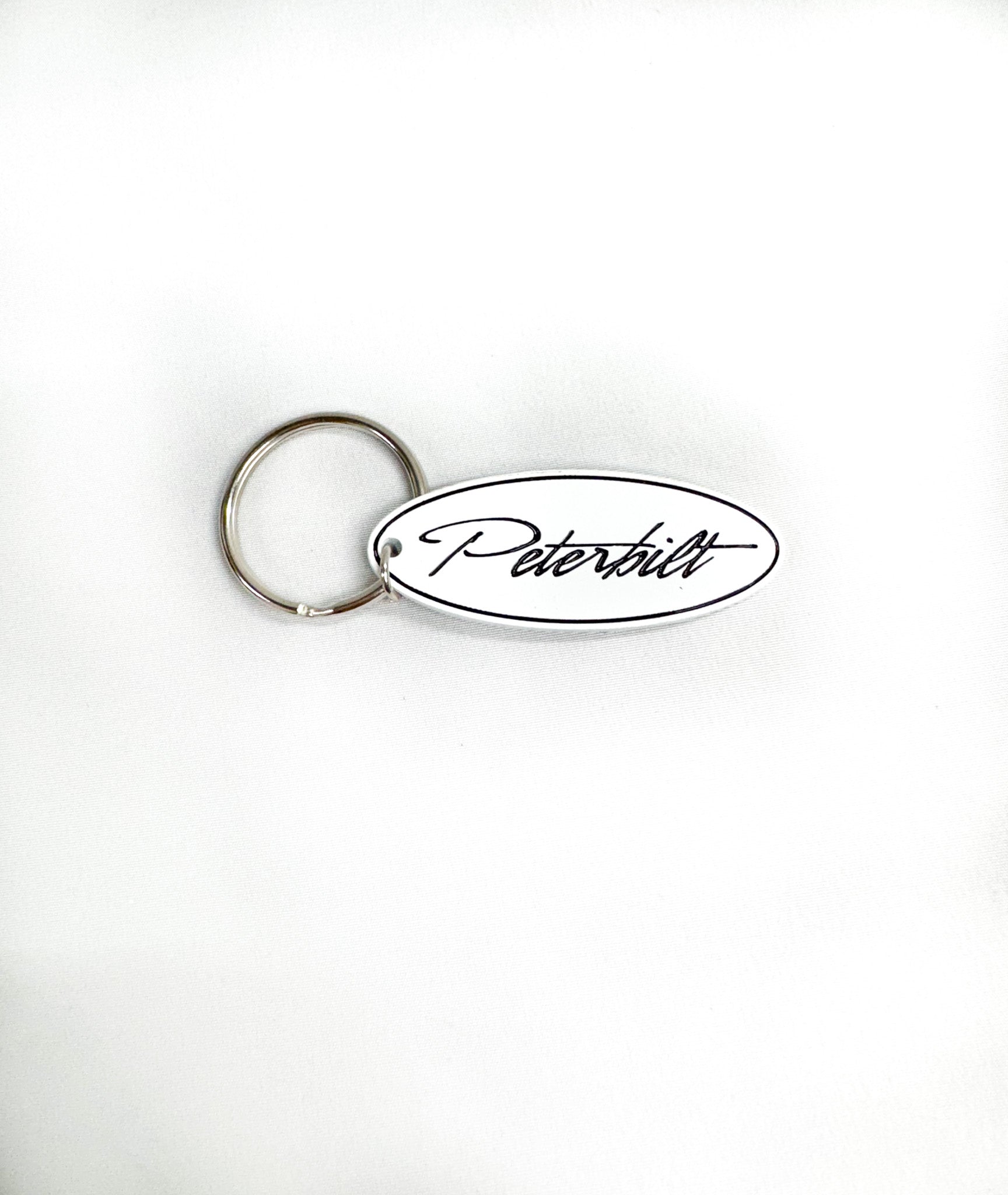 Peterbilt Oval Fancy Script Keychains